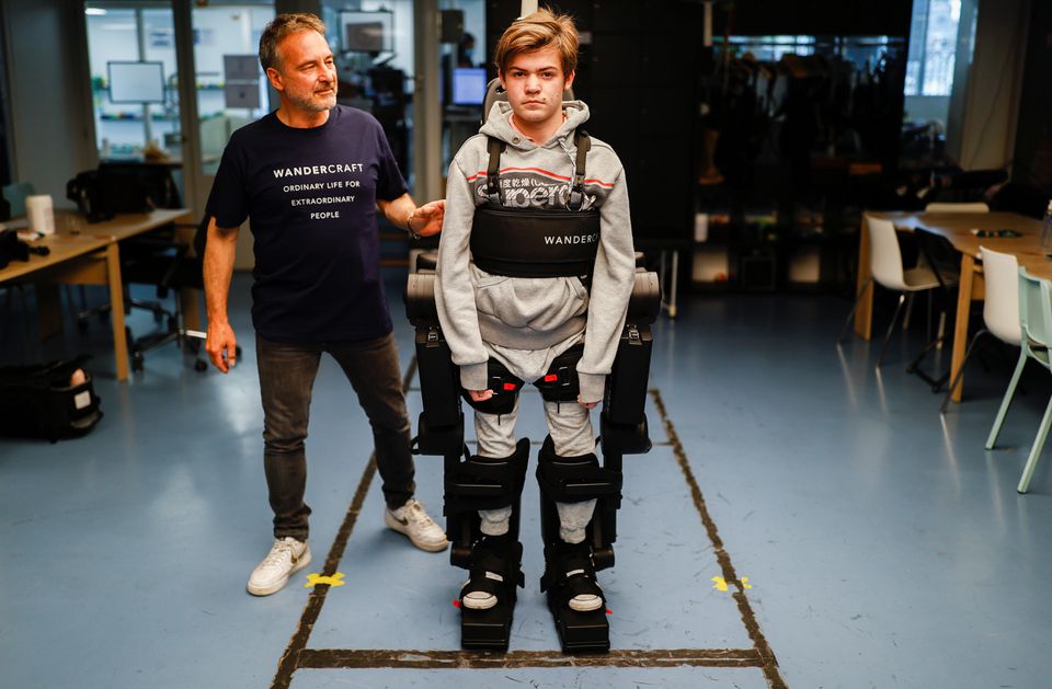 Father builds exoskeleton suit to help his son and others walk for the ...