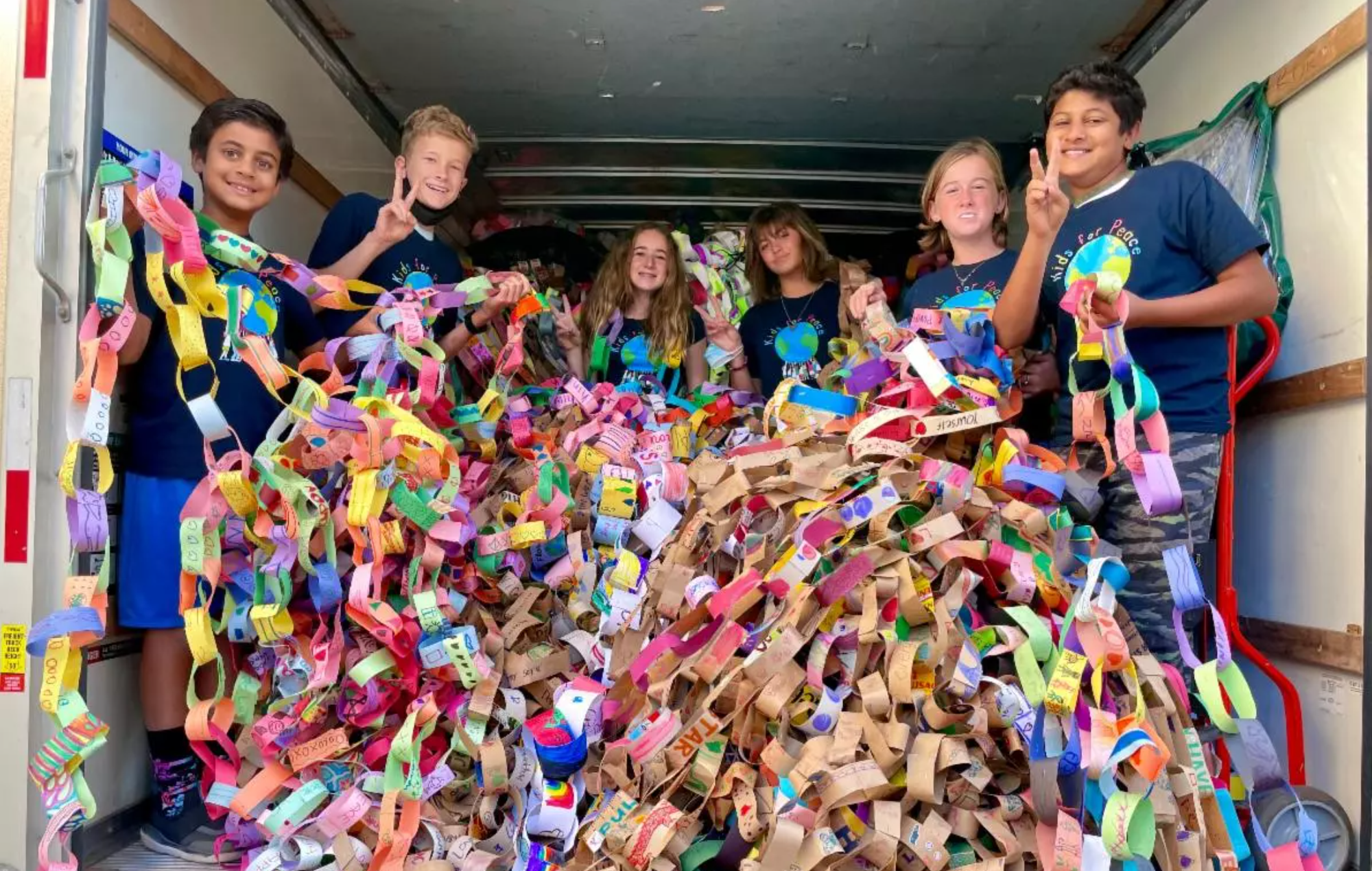 Messages of kindness and peace from students around the world forms a ...