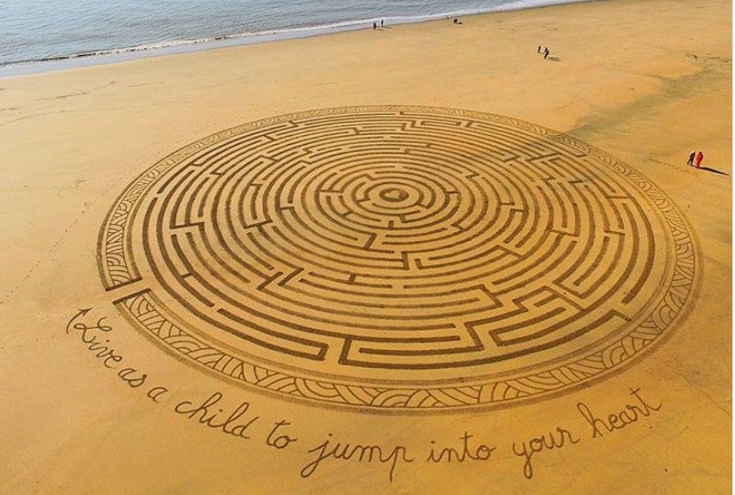 French artist creates huge sand images that are ultimately washed away ...