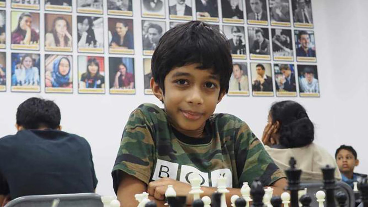 Eight-year-old prodigy becomes youngest chess player to beat ...