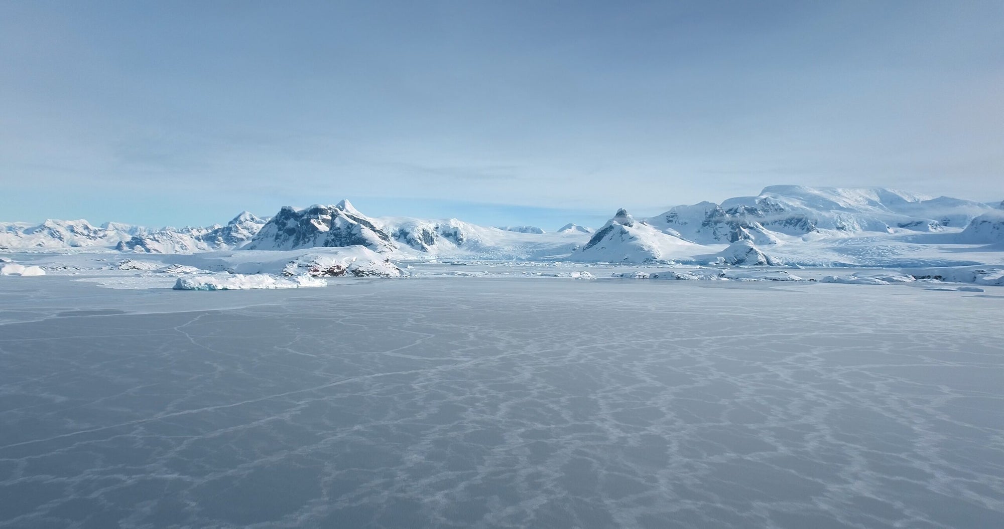 Warming ice awakens microbes that could speed climate change - The ...